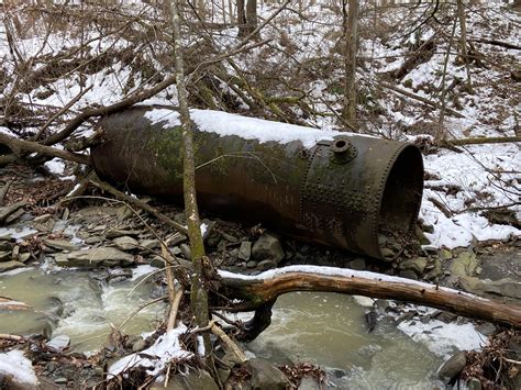 Huge Metal Riveted Pipe In Stream Some Kind Of Boiler Rwhatisthisthing