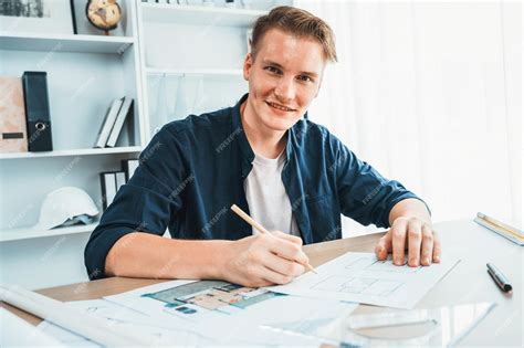 Premium Photo Portrait Of Architect Designer Sit At Desk In Office Brainstorm Idea For