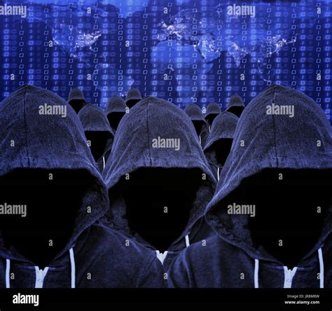hooded mass of unknown faceless computer hacker and cyber criminals