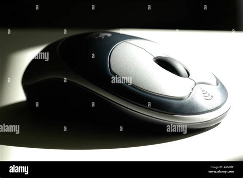 A Contemporary Wireless Computer Mouse With Two Buttons And A Scroll Wheel Which Can Also Act As