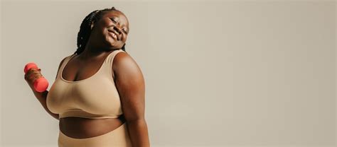 Premium Photo Confident Plus Size African Woman In Sportswear