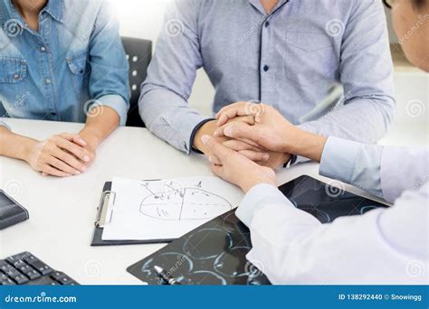 Patient Being Reassured Desperate Holding Hand By Doctor Encouraging Support And Comforting With