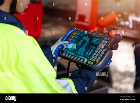 Smart Engineer Staff Worker Use Digital Remote Control Operate Industry