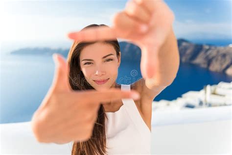 Beautiful Young Woman Framing Face With Hands For Photography Portrait