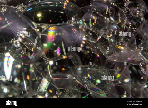 Abstract Macro Close Up Of Bubble Blowing Multiple Small Bubbles With