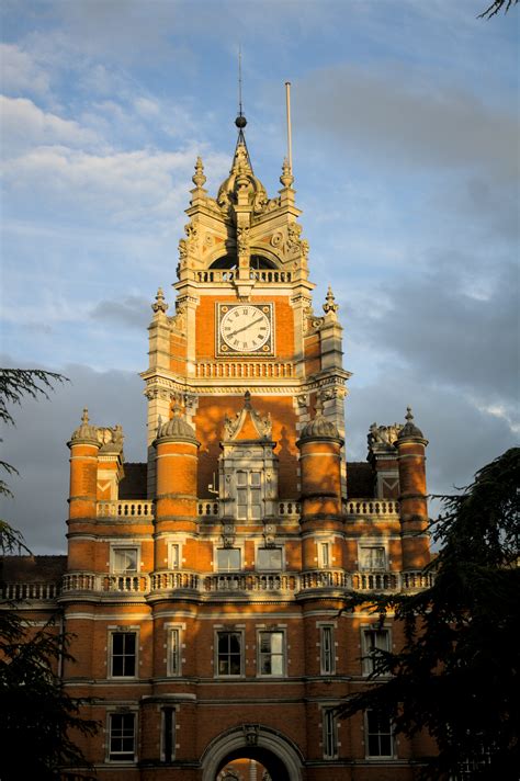 A Beautiful Classic Clock Tower Lit By Sunlight Photo Free Travel