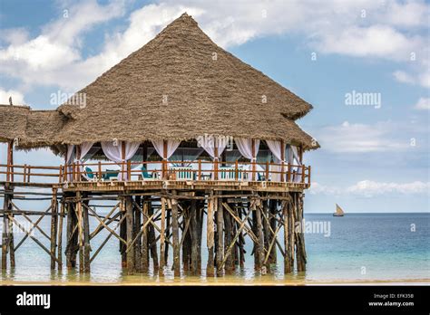 Bar and cafe on water in Zanzibar, Tanzania Stock Photo, Royalty Free ...
