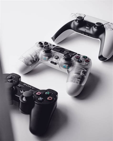 Download Three Different Ps3 Controllers Wallpaper