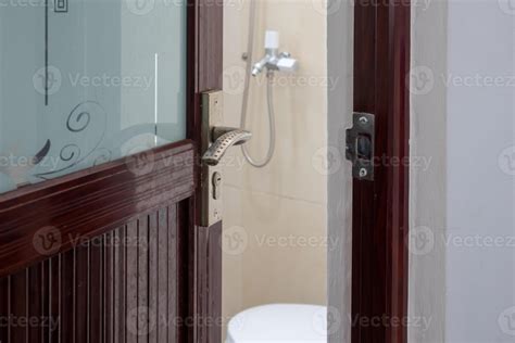 Close Up View Of The Bathroom Door Opened Half Open Door Of A Bathroom
