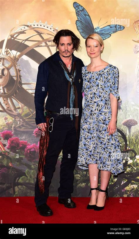Johnny Depp And Mia Wasikowska Attending A Photocall For New Film Alice