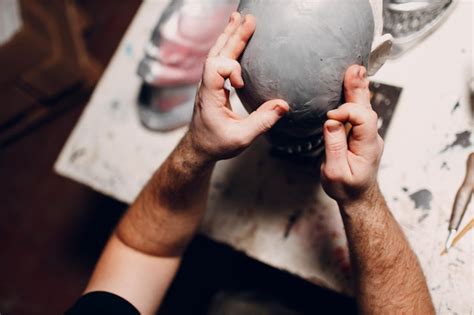 Premium Photo Artisan Craftsman Create Mask Based On Plaster Cast