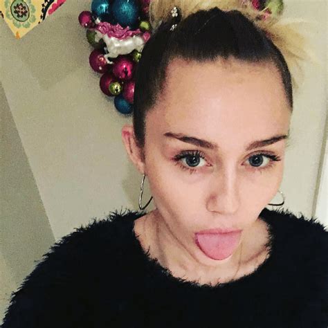 Miley Cyrus Ear Tattoo