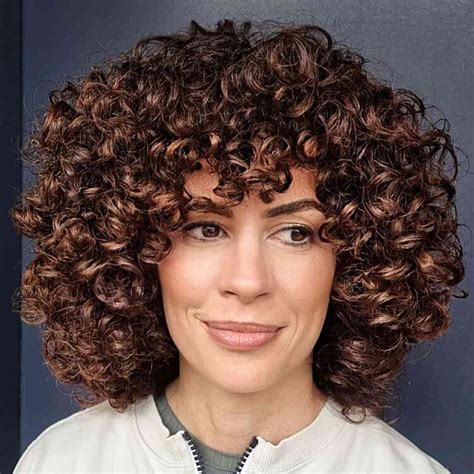 49 Best Short Curly Hair With Bangs To Try This Year