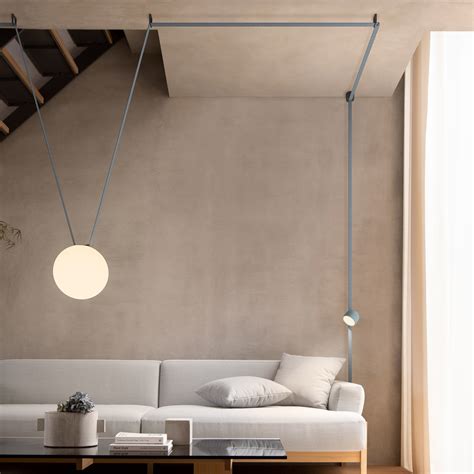 Michael Anastassiades Creates Modular Lighting System Based On Jewellery Chains For Flos
