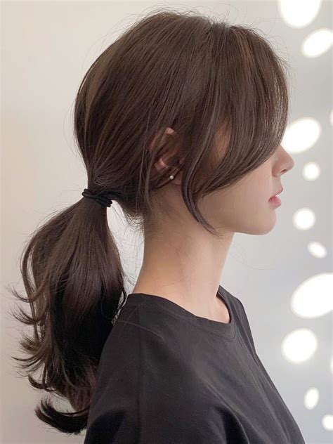 Side Bangs With Layered Hair Ponytail