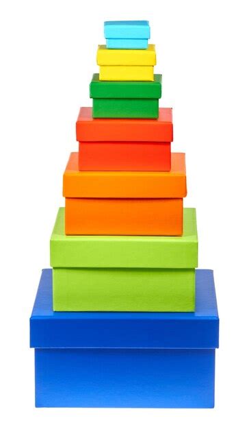 Premium Photo Stack Of Multi Colored Boxes Against White Background