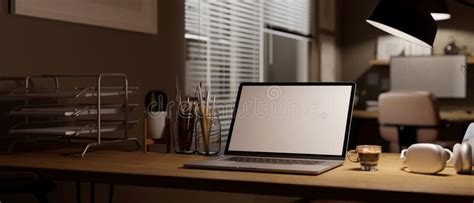 Workspace With Laptop Mockup And Decor On Wood Table In Modern Office
