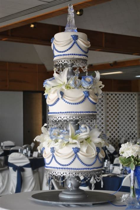 Sapphire And Ivory Wedding Cake With Blue Pearls And Roses