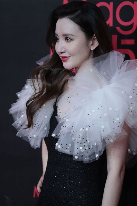 Zhang Meng Shows Her Cleavage At The Cosmo Event 12 Photos Thefappening