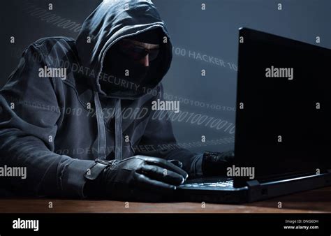 Hacker Stealing Data From A Laptop Stock Photo Alamy