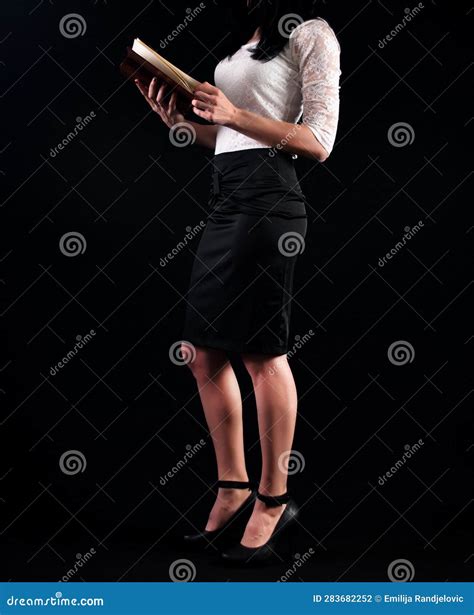 Immersed In Knowledge Elegant Woman Embracing The Joys Of Reading