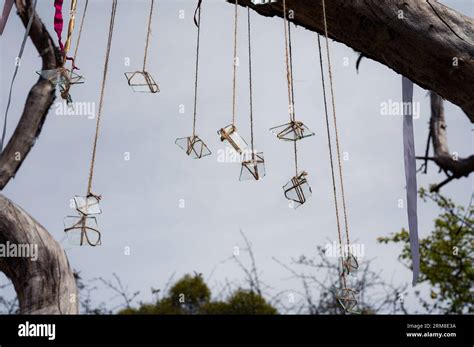 Symbolic Group Of Pieces Of The Glass On The Strings And White Ribbon