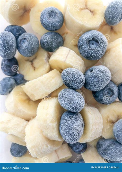 Frozen Blueberry And Raspberry In Ice Cubes On White Background Stock