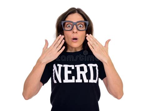 Portrait Of Beautiful Nerd Woman With Eyeglasses Looking Shocked Stock