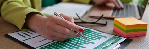 Premium Photo Analyst Employee Working With Financial Report On Computer And Documents
