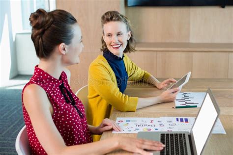 Smiling Business Executives Interacting with Each Other in Conference Room Stock Image - Image ...