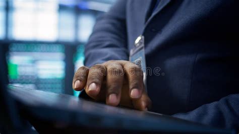 close up shot of worker looking for data center network issues using
