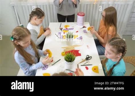 Girls At The Lesson With The Teacher Sew A Soft Toy With Their Own Hands Stock Video Footage Alamy