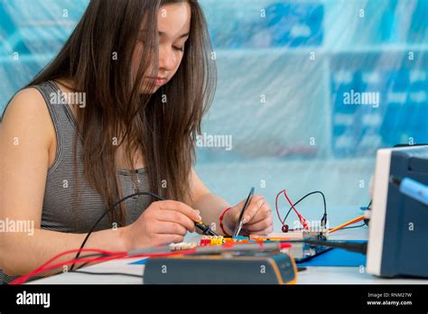 Babegirl In Electronics Class Stock Photo Alamy