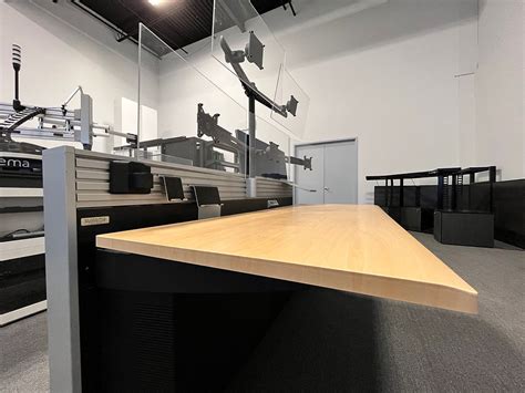 Get Your Control Consoles Organized With A Slat Wall For A Clutter Free