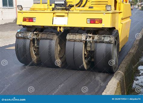 Pneumatic Roller Compactor At Asphalt Pavement Works For Road Repairing