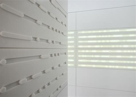 Fluid Architecture Adds Secret Doors Inside Serbian Clinic