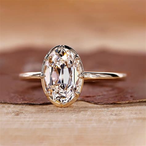 Old Mine Cut Oval Diamond Solitaire Engagement Ring Claw Prong Bezel