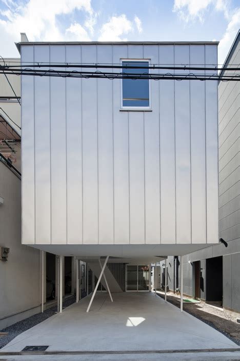 house by alphaville has three blocks connected by bridges