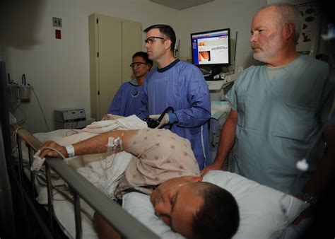 file us navy 110405 n ka543 028 hospitalman urian d thompson left lt cmdr eric a lavery