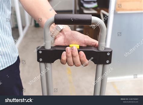 Closeup Shot Man Carrying Portable Trolley Stock Photo 2190758487 Shutterstock