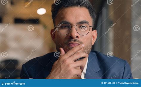 Pensive Guy Arabian Indian Business Man Thinking Looking At Camera Close Up Male Thoughtful