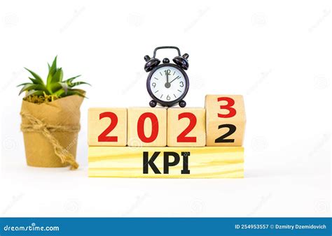 KPI Key Performance Indicator Symbol Turned Wooden Cubes With Words KPI And KPI On
