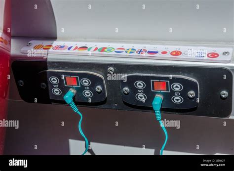 Controls On A Guided Tour Bus Where You Plug In A Set Of Headphones And Select A Language And