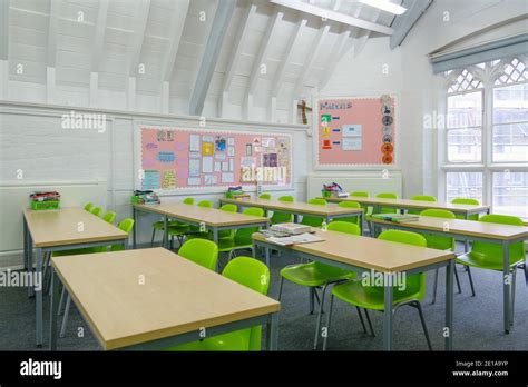 Typical Primary Middle School Classroom In The Uk With Desks And