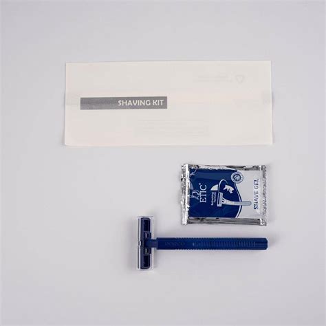 Shaving Kit In White Pouch