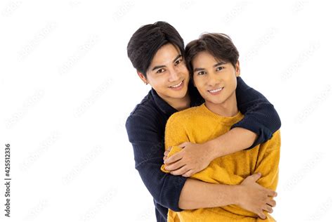 Portrait Of Young Cute Asian Gay Couple Love And Hugging With Smiling On White Background