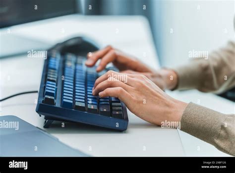 Close Up Developer Hand Coding With Keyboard On Desk At Modern Office