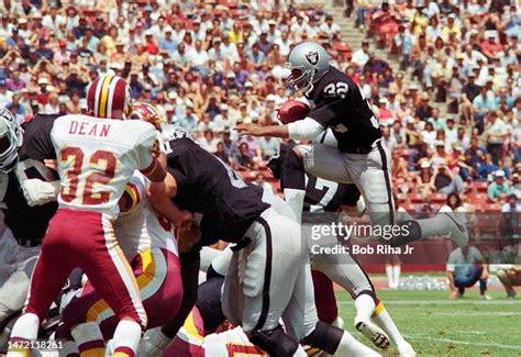 Raiders Rb Marcus Allen Dives Over Linemen Near Goal Line To Score A