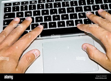 Man Typing On The Black Laptop Keyboard Stock Photo Alamy