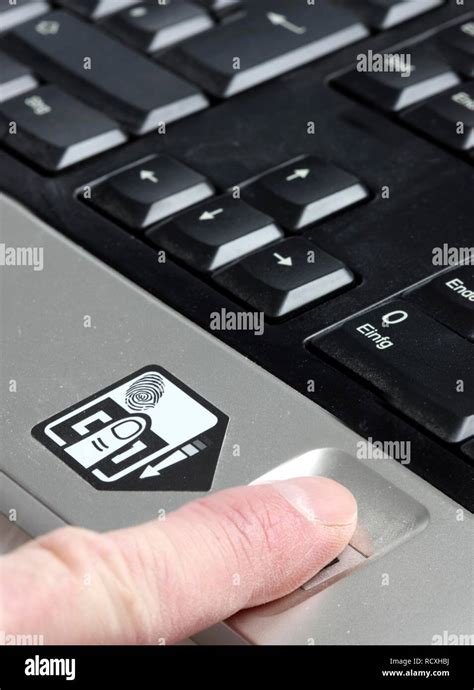 Computer Keyboard With A Fingerprint Reader Only Registered Users Can Operate The Computer